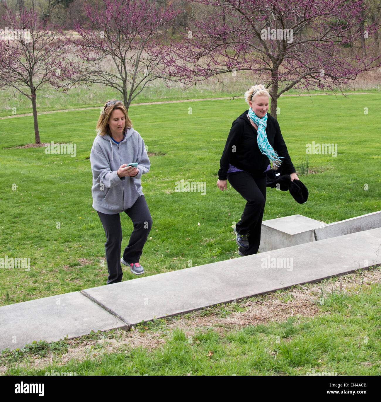 Women climbing stairs hi-res stock photography and images - Alamy