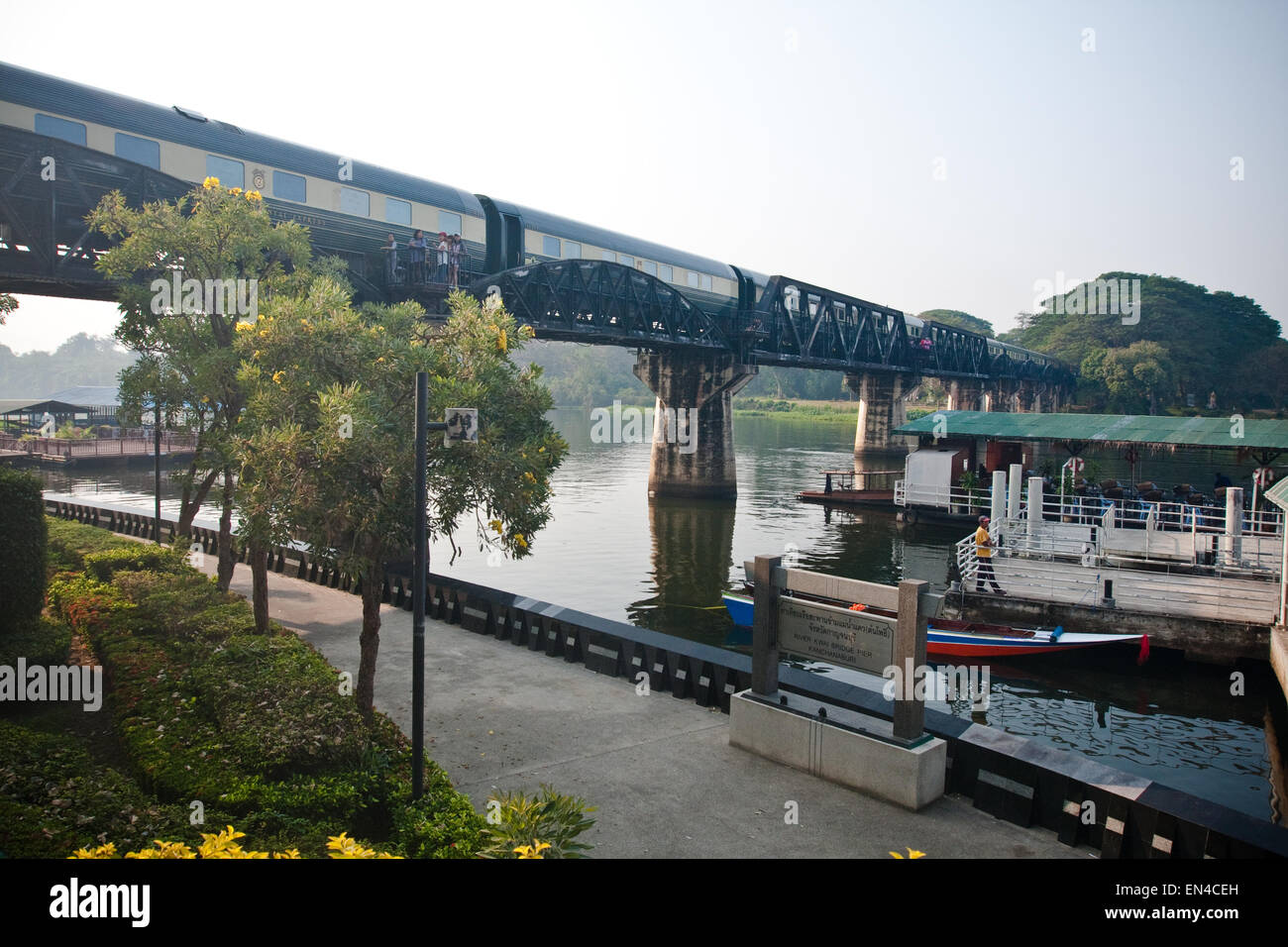 Tourist visiting the bridge over river Kwai, Kanchanaburi, Thailand ...
