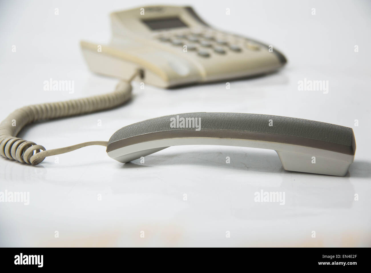 A home phone on a white background Stock Photo - Alamy