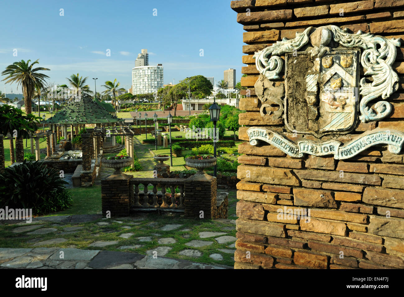 Weathered emblem on wall of green sunken garden built by POWs on famous ...