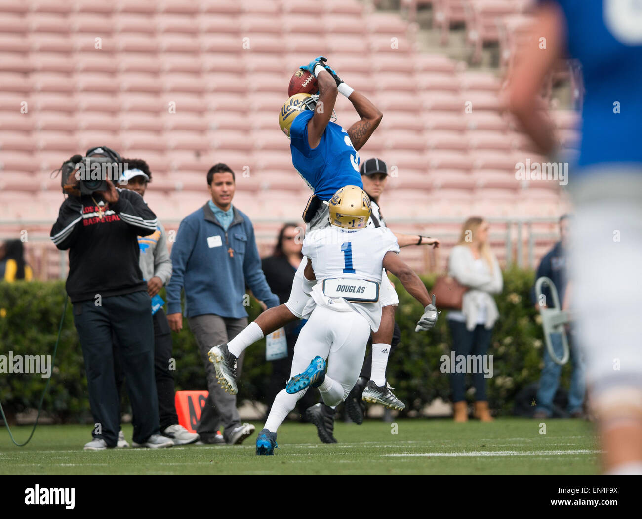 Pasadena, CA. 25th Apr, 2015. UCLA receiver (3) Jordan Lasley makes a ...