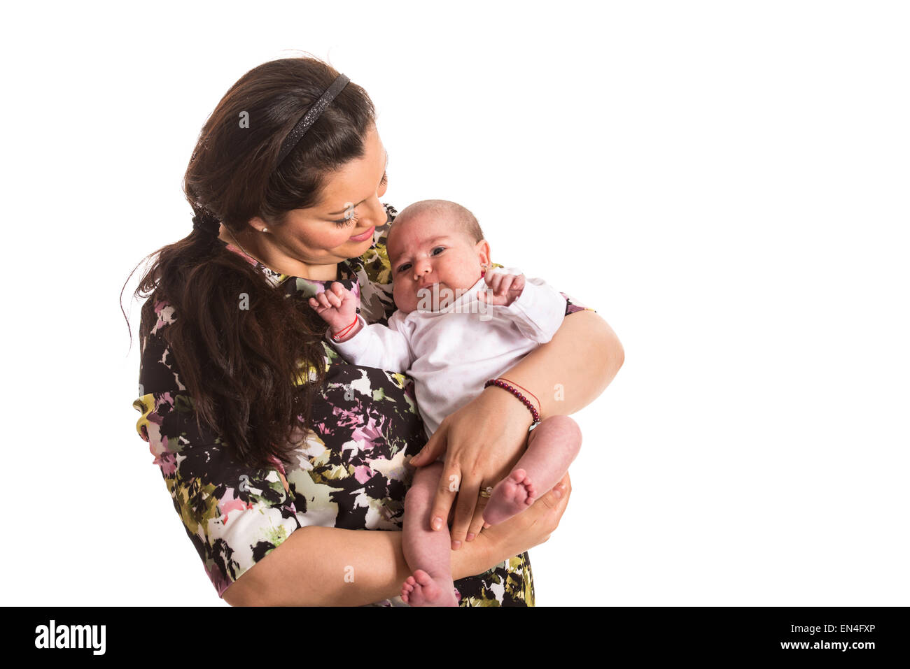 Mother caring newborn baby girl isolated on white background Stock ...