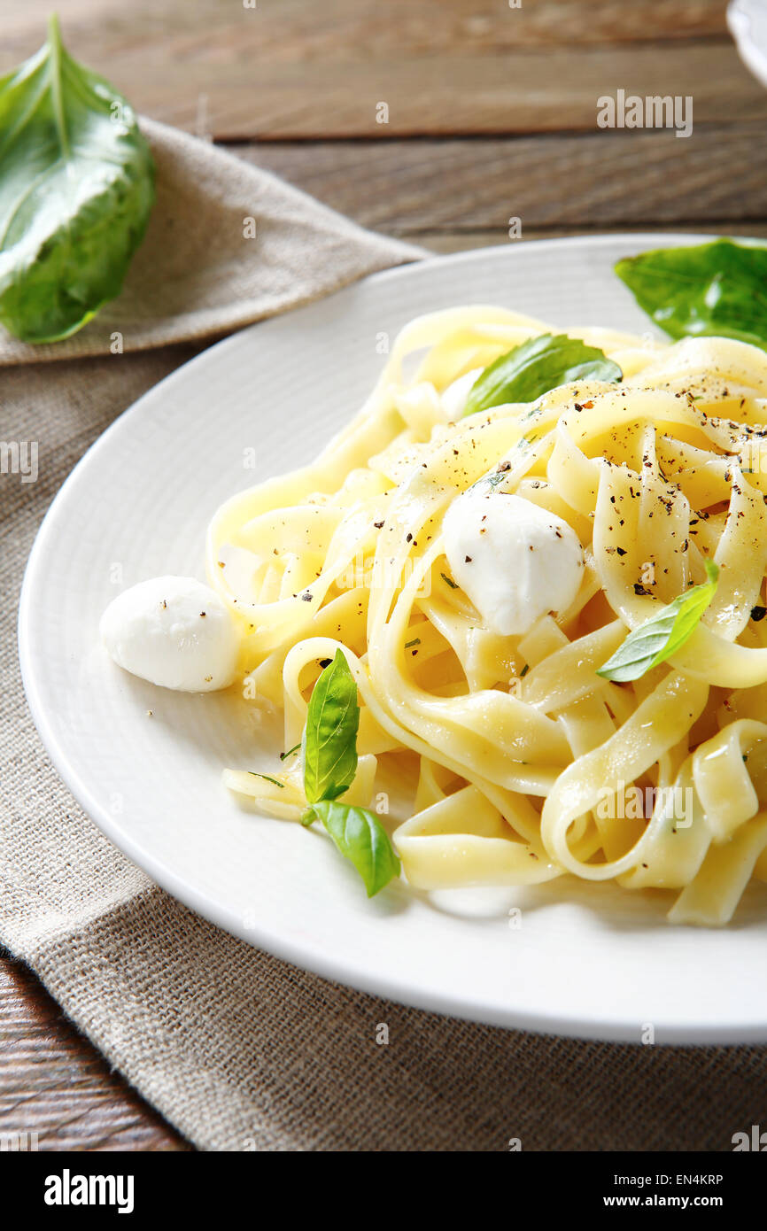Tagliatelle with mozzarella cheese, food Stock Photo - Alamy