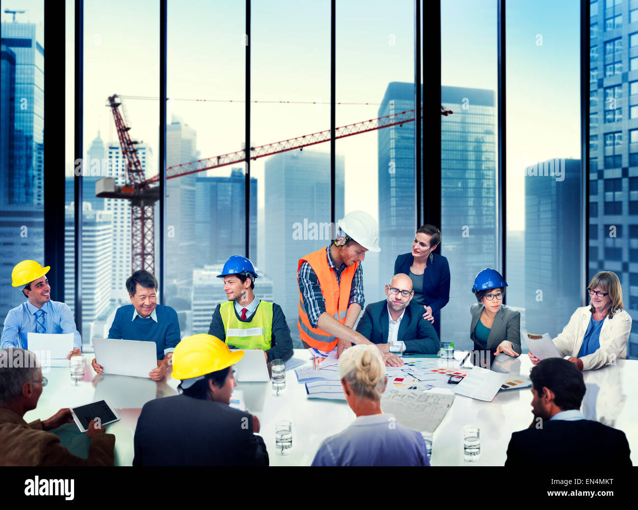 Engineer engineering group helmet hi-res stock photography and images ...