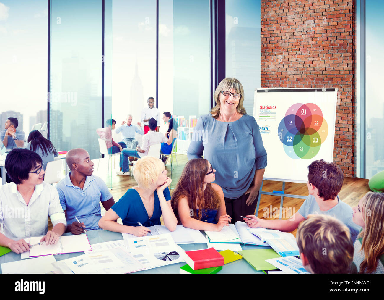 Multiethnic Group of People Discussion in the Office Stock Photo - Alamy