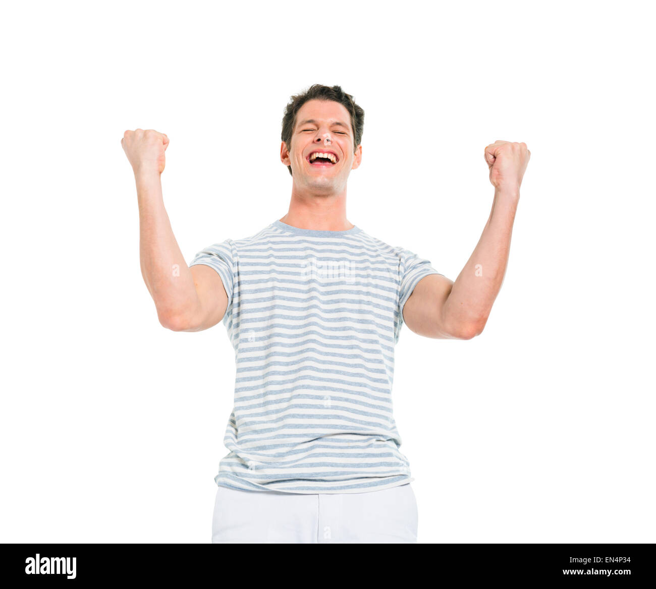 Cheerful Casual Man Celebrating Victory Stock Photo - Alamy