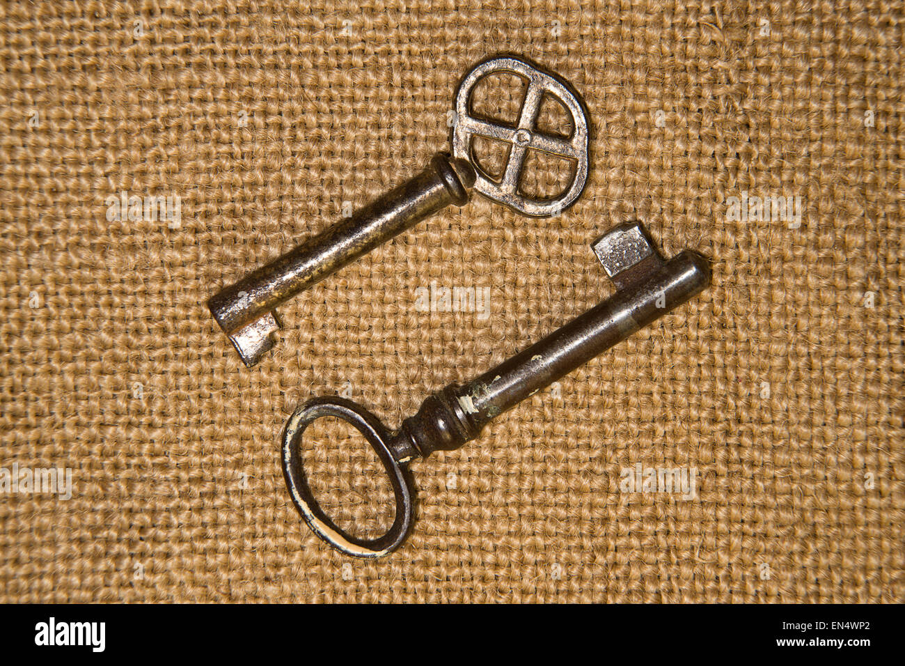 Two Vintage keys on old cloth Stock Photo - Alamy