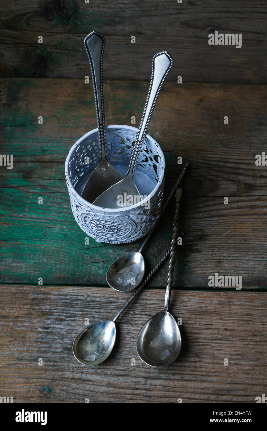 Vintage silverware on the old wooden table Stock Photo - Alamy