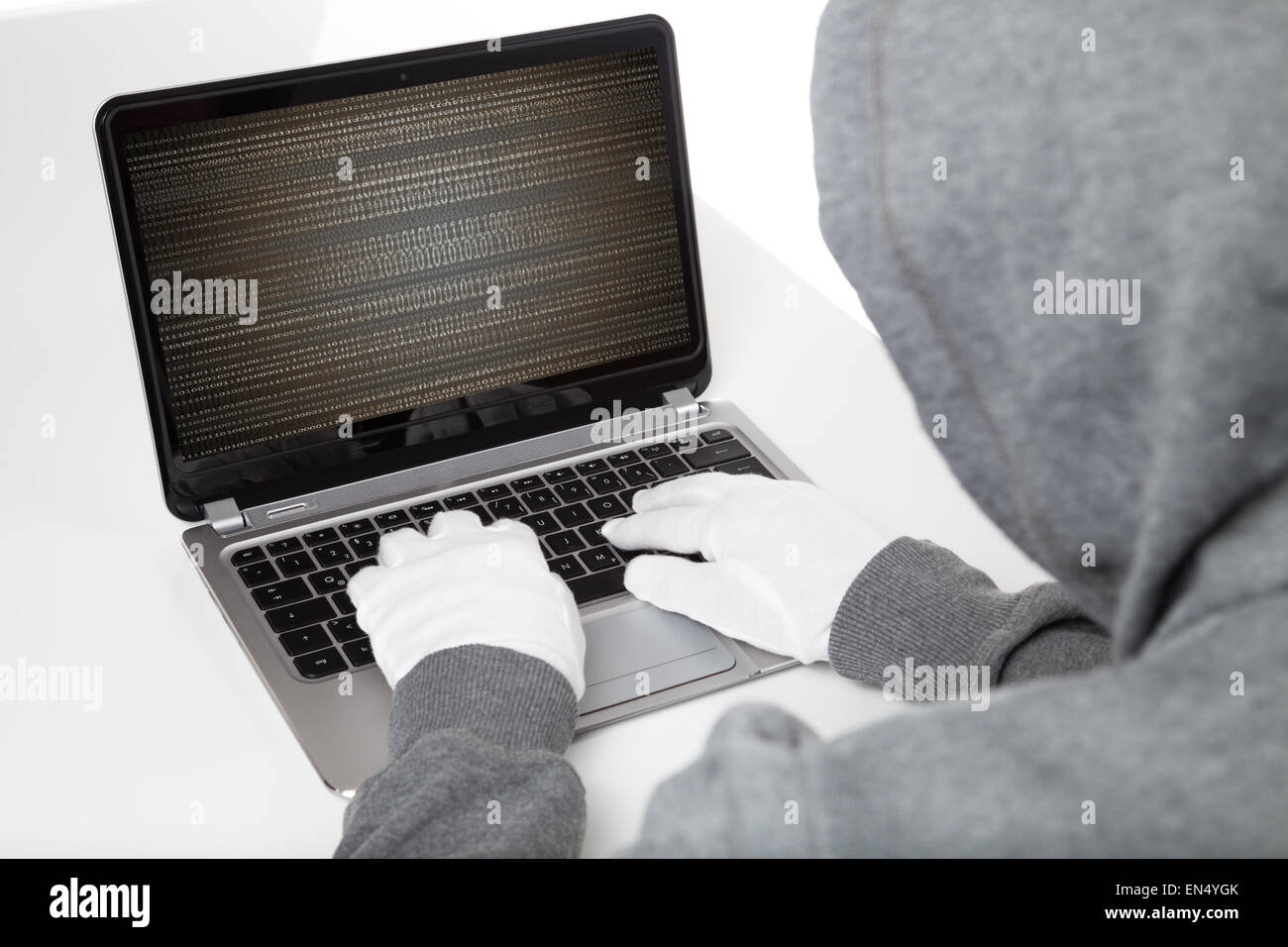 hacker on keyboard with white gloves Stock Photo - Alamy