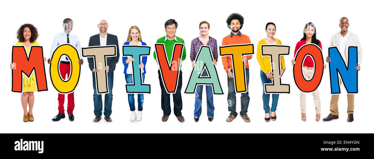 Group of People Standing Holding Motivation Letter Stock Photo - Alamy