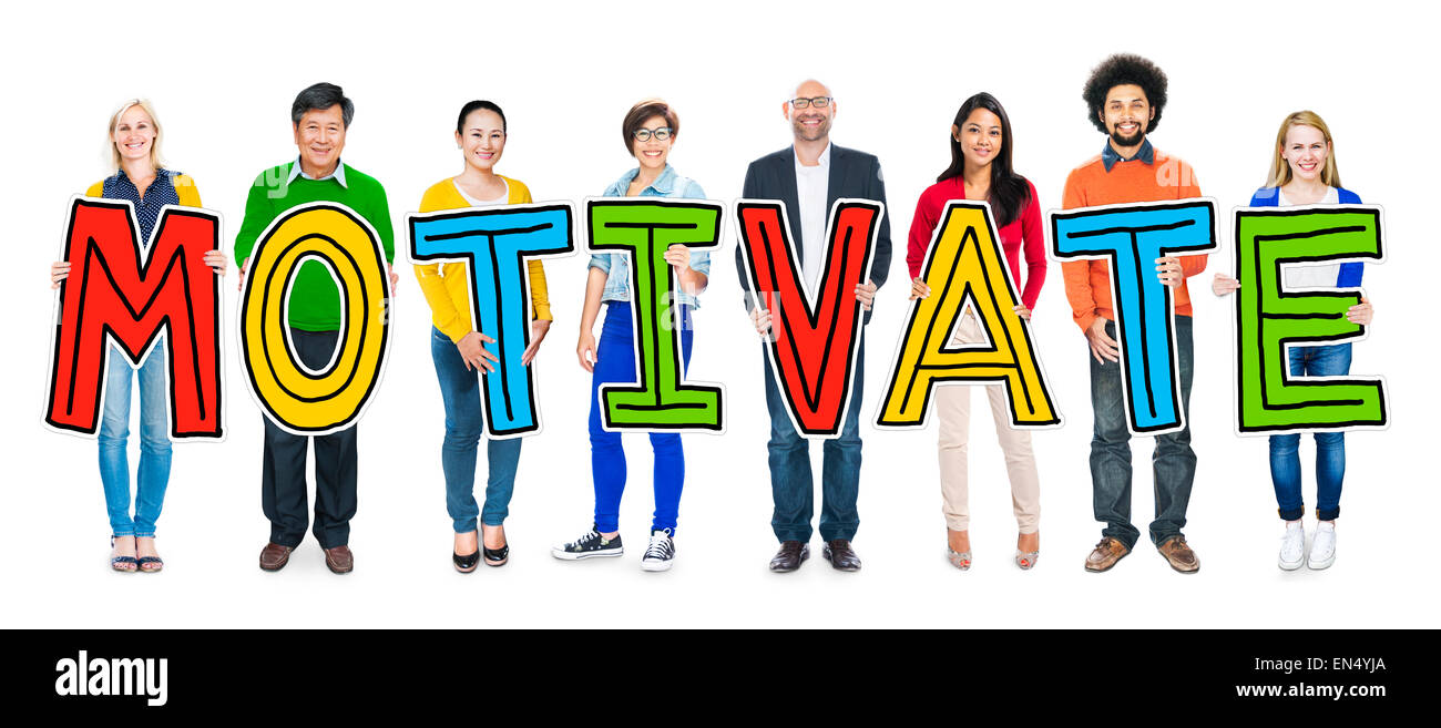 Multiethnic Group of People Holding Motivate Stock Photo - Alamy