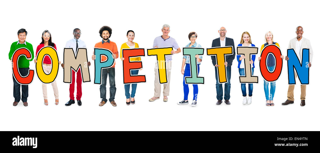 Group of People Standing Holding Competition Letter Stock Photo - Alamy