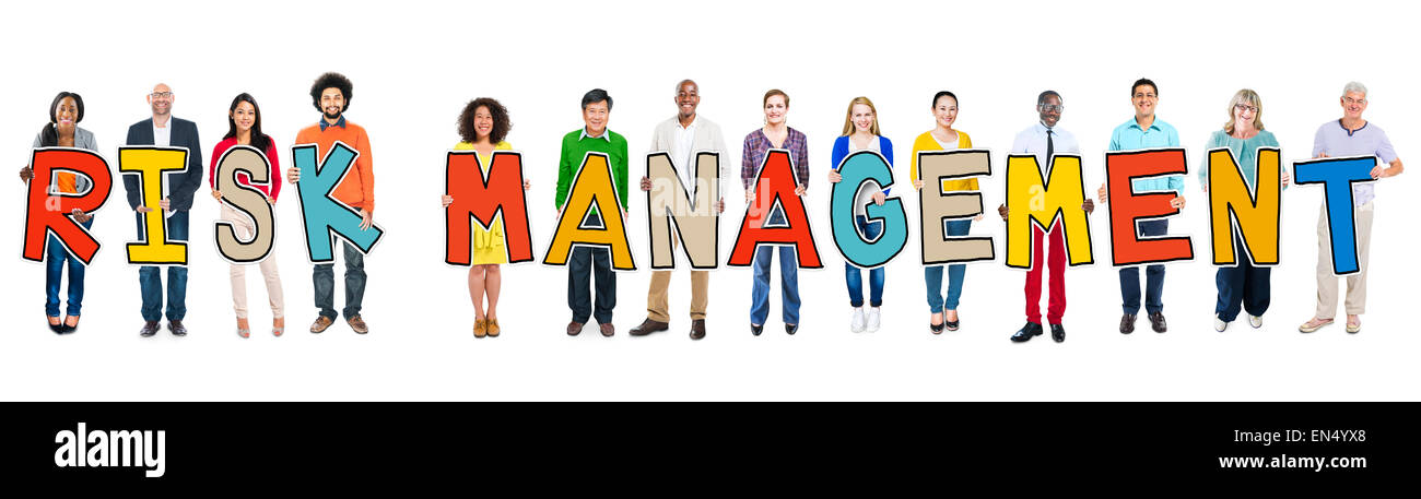 Diverse Group of People Holding Text Risk Management Stock Photo - Alamy