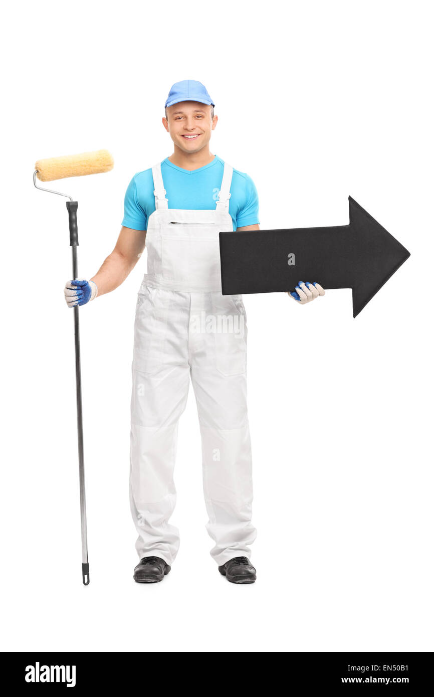 Full length portrait of a young male decorator in a white uniform ...