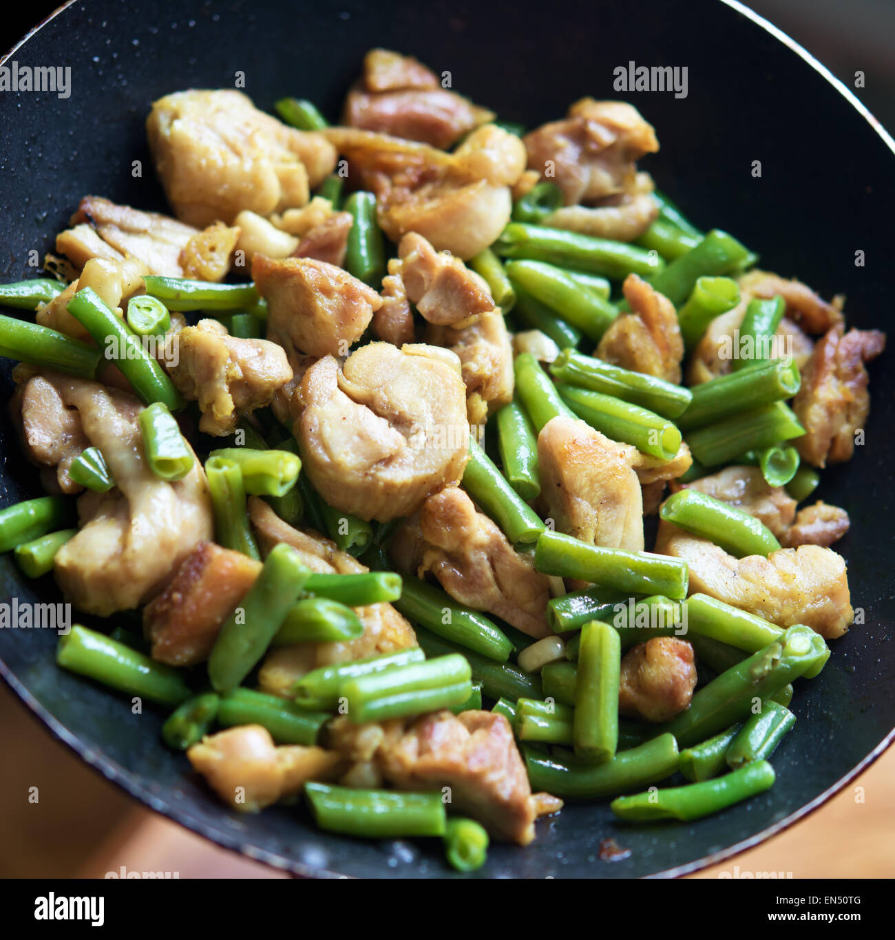 Green beans fried in hi-res stock photography and images - Alamy