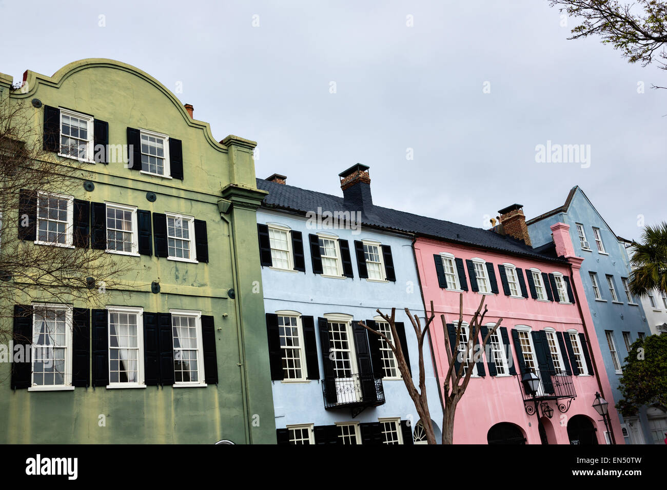 Colorful pastel building facades on Rainbow Row along East Bay Street ...