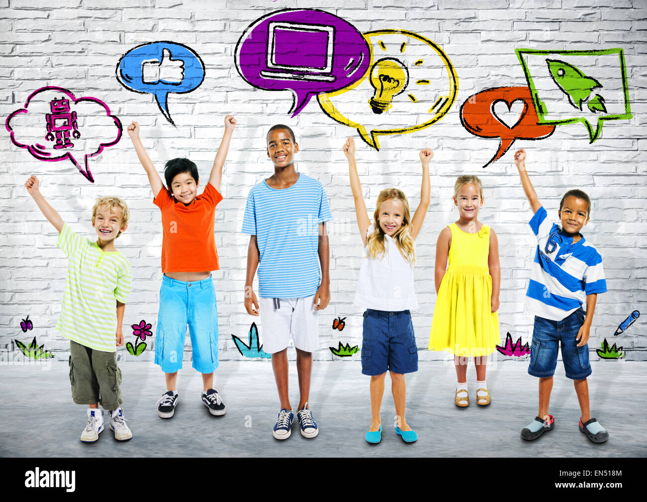 Smart kids with icons Stock Photo - Alamy