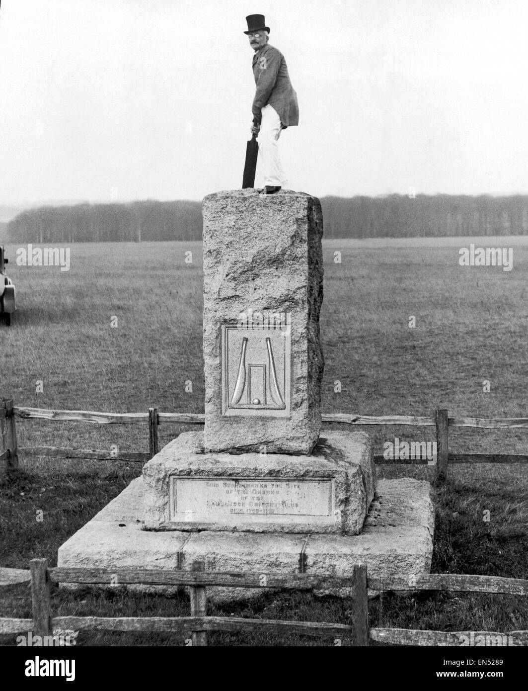 Piccolo Jim stands atop a stone marking the site of the ground of the ...