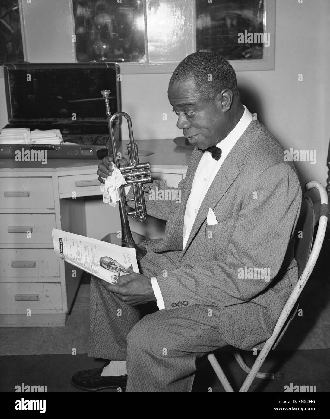Louis Armstrong seen here in his dressing room before performing in ...