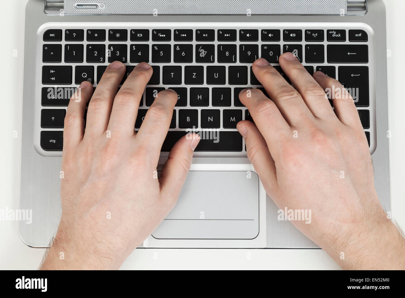 hands typing on laptop top view Stock Photo - Alamy