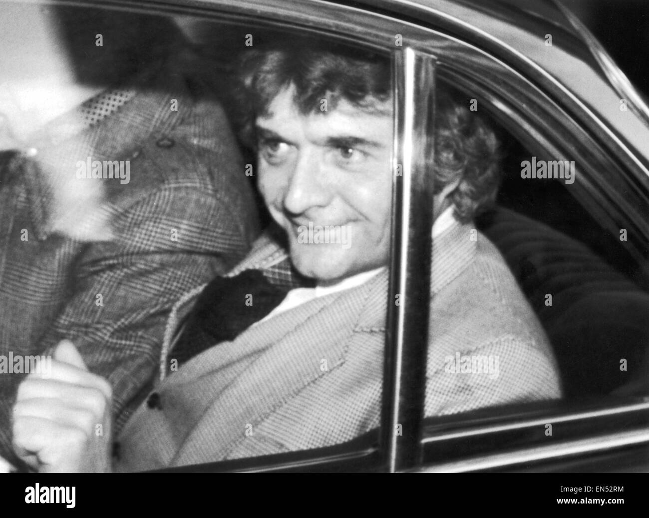 London gang boss Ronald Knight gives the thumbs up as he is driven away ...