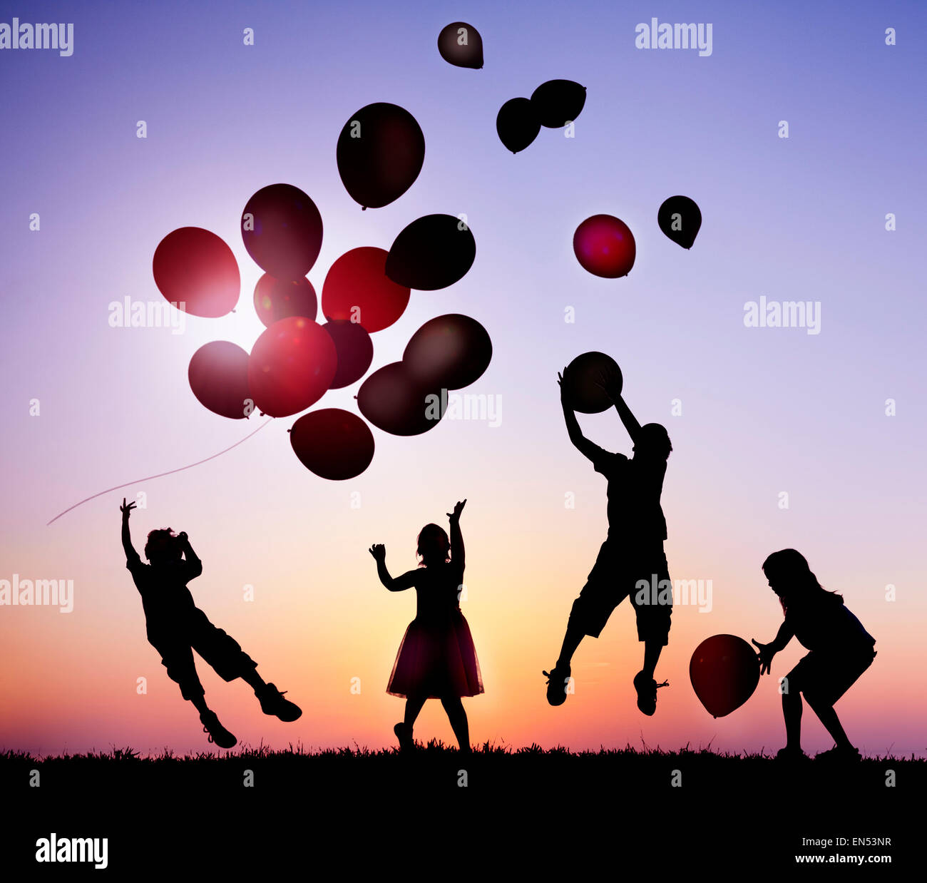 Children Outdoors Playing with Balloons Stock Photo - Alamy