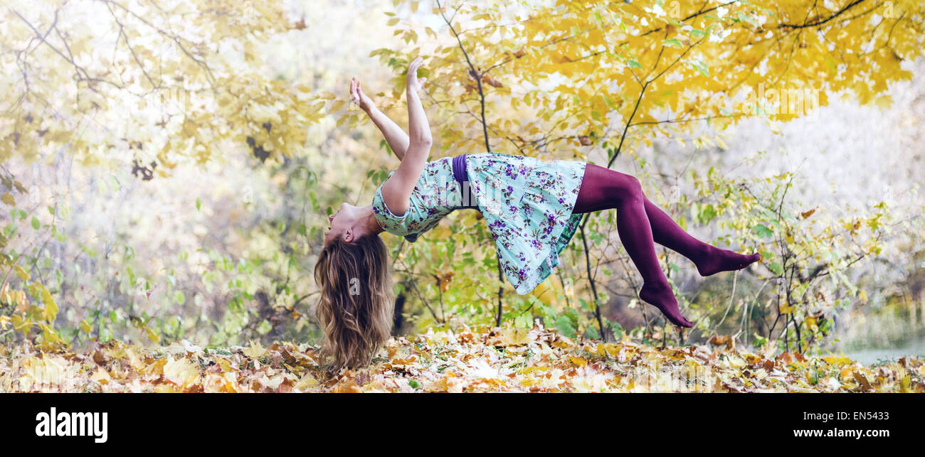 Levitation portrait of young woman Stock Photo - Alamy