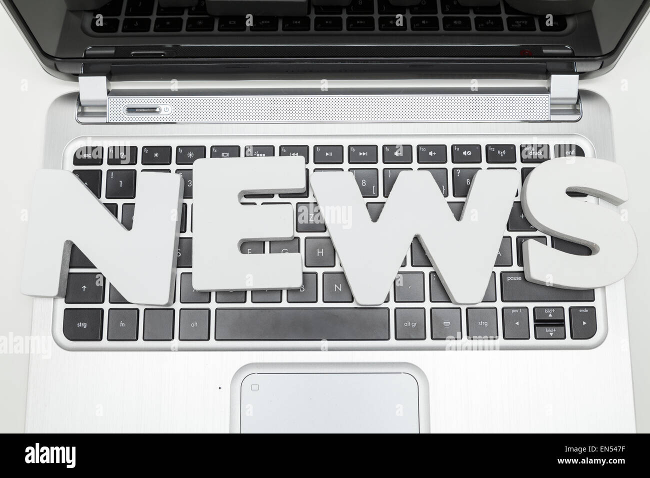 news letters on keyboard of laptop Stock Photo - Alamy