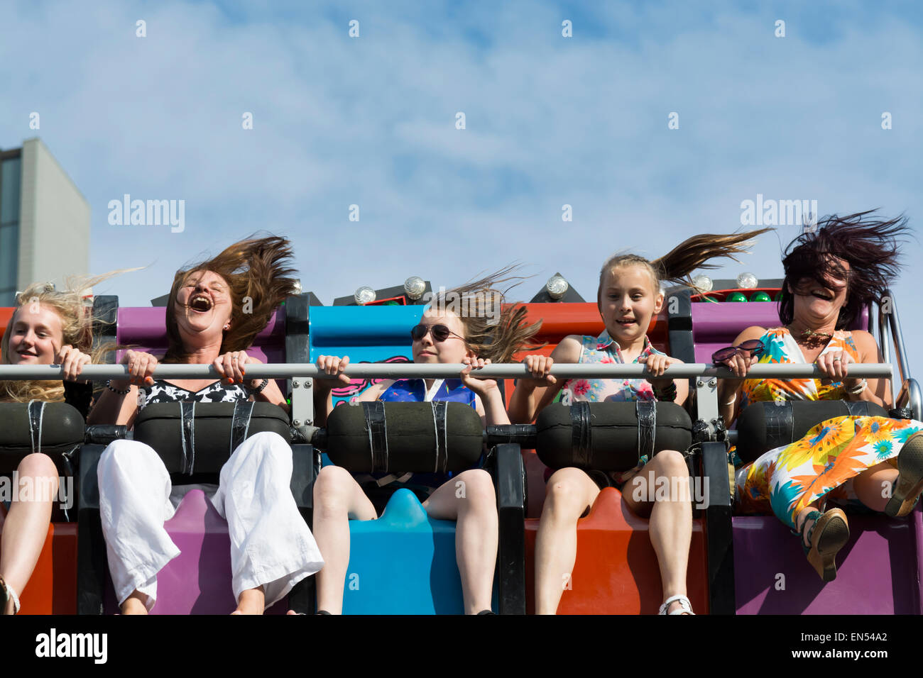 People laughing on fairground ride at Music festival in Sheffield South ...