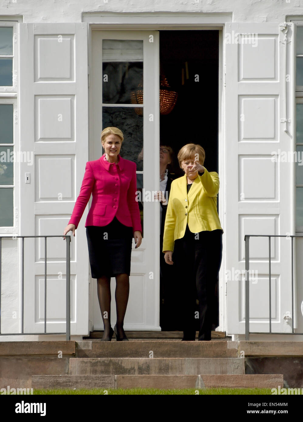 German Chancellor Angela Merkel (R) and Danish Prime Minister Helle ...