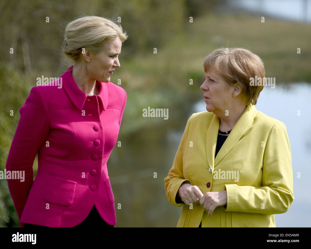 German Chancellor Angela Merkel (R) and Danish Prime Minister Helle ...