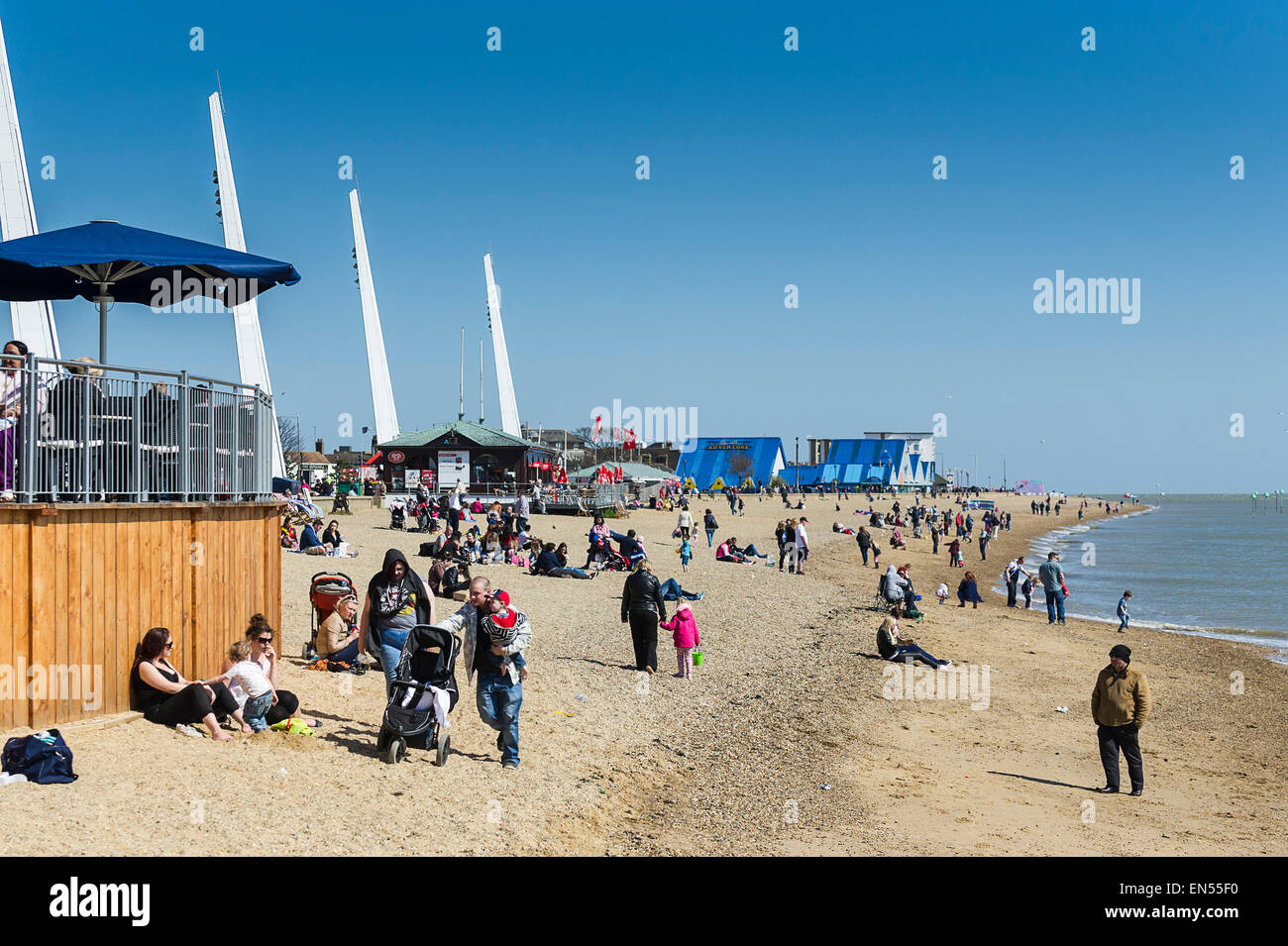 People enjoying the sunny weather on Jubilee beach in Southend Stock ...