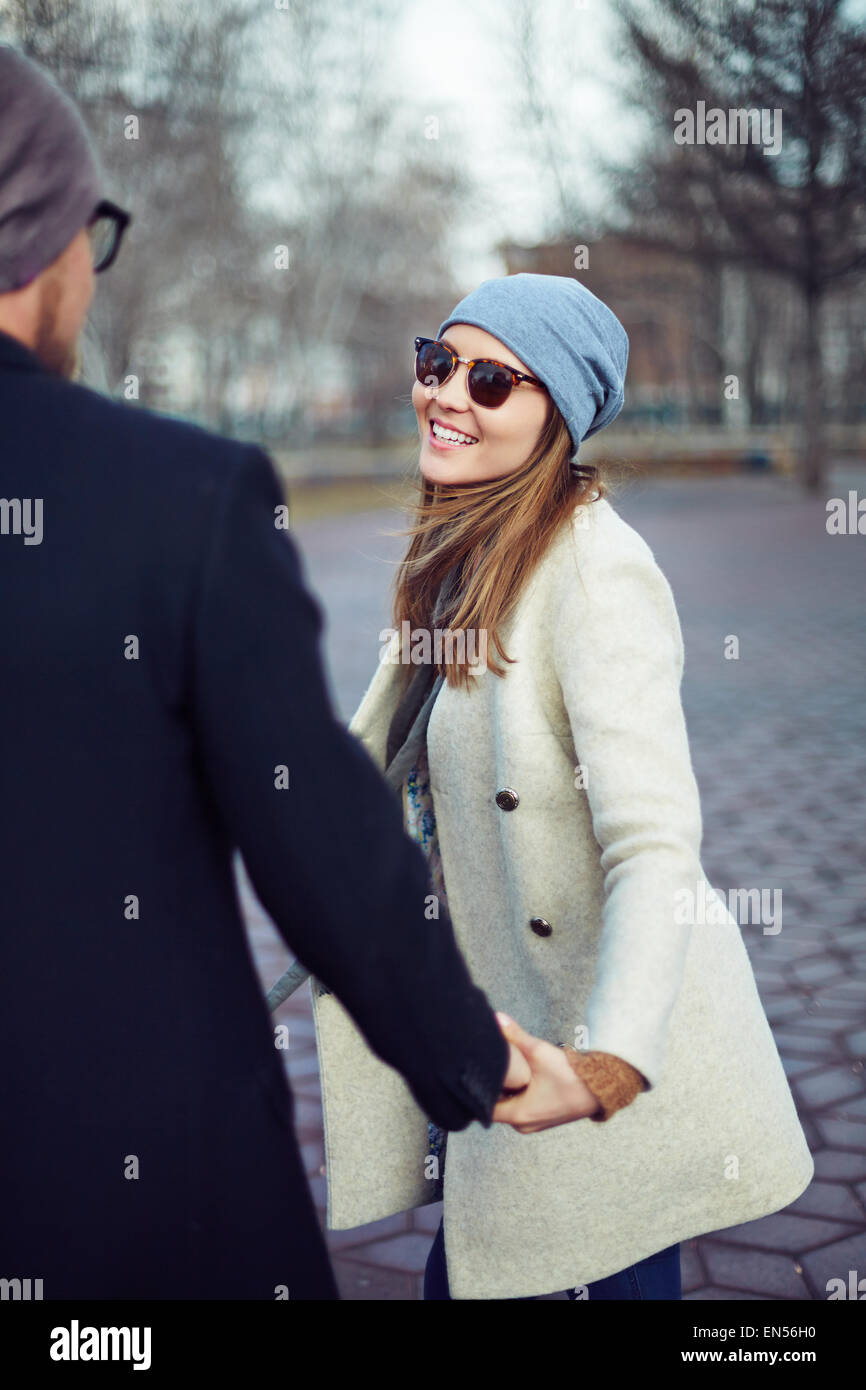 Stylish girl flirting with her boyfriend outdoors Stock Photo - Alamy