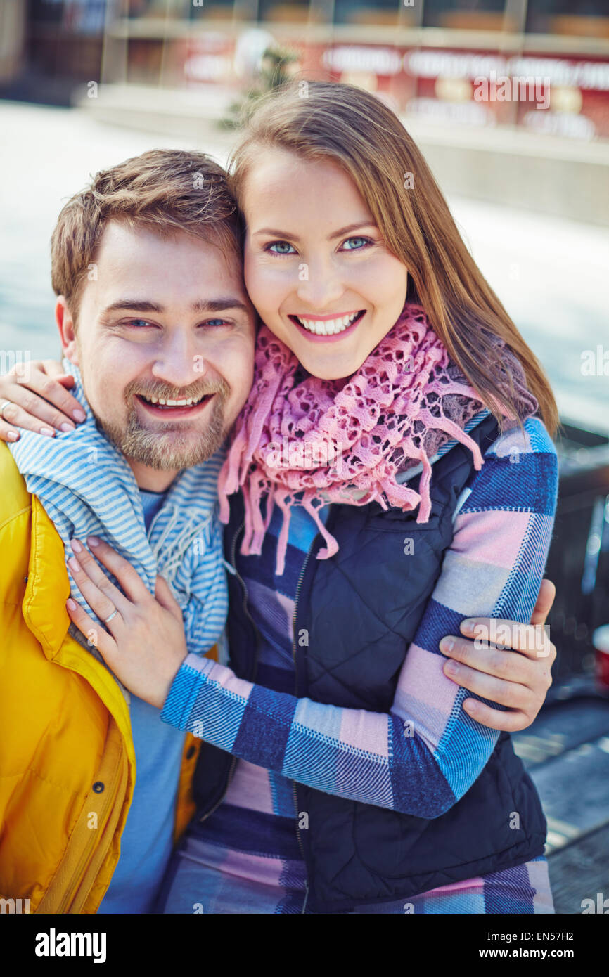 Romantic couple in stylish casualwear looking at camera Stock Photo - Alamy