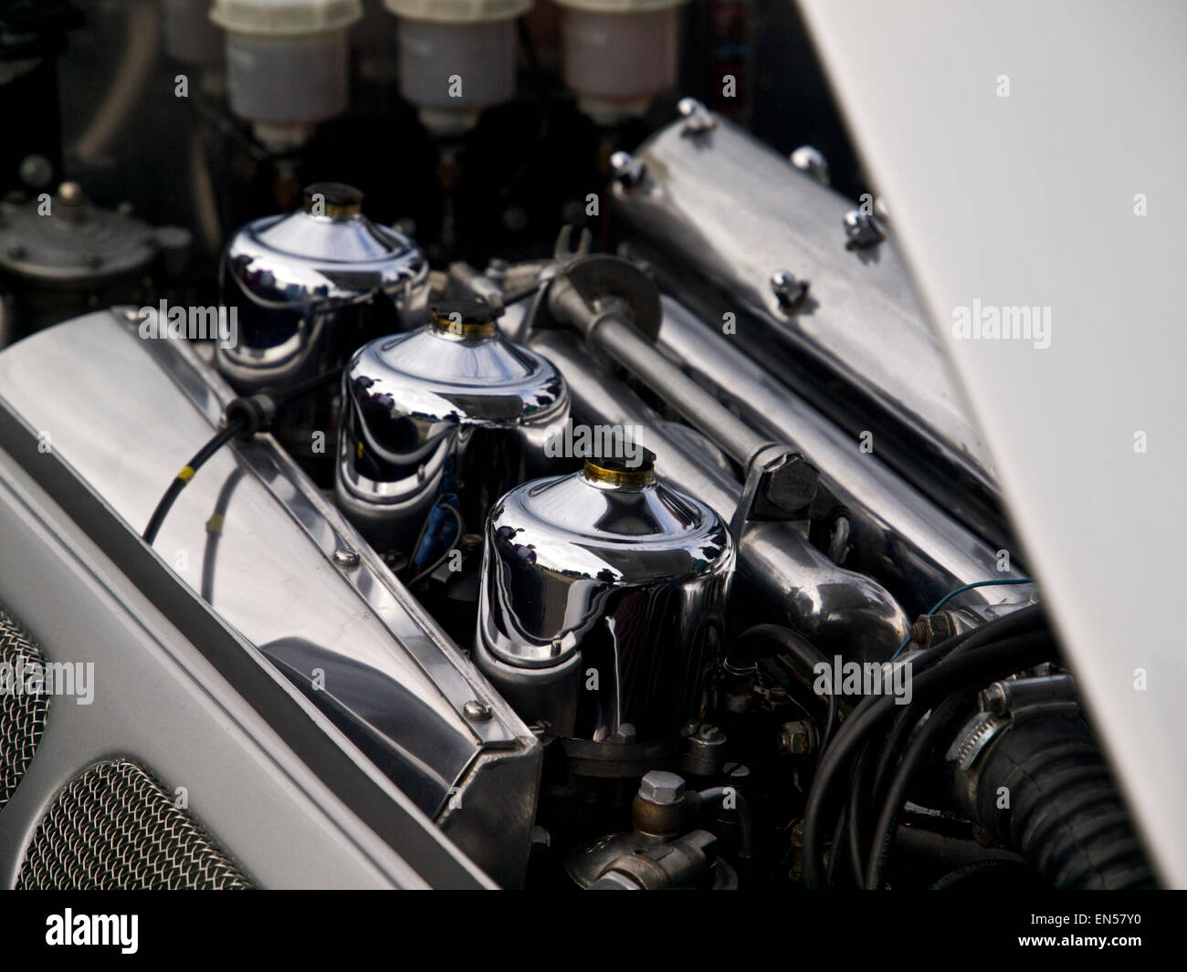 Carburettors under the bonnet of a performance car Stock Photo - Alamy
