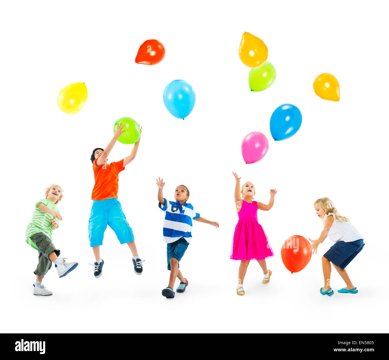 Happy Multi-Ethnic Children Playing Balloons Together Stock Photo - Alamy