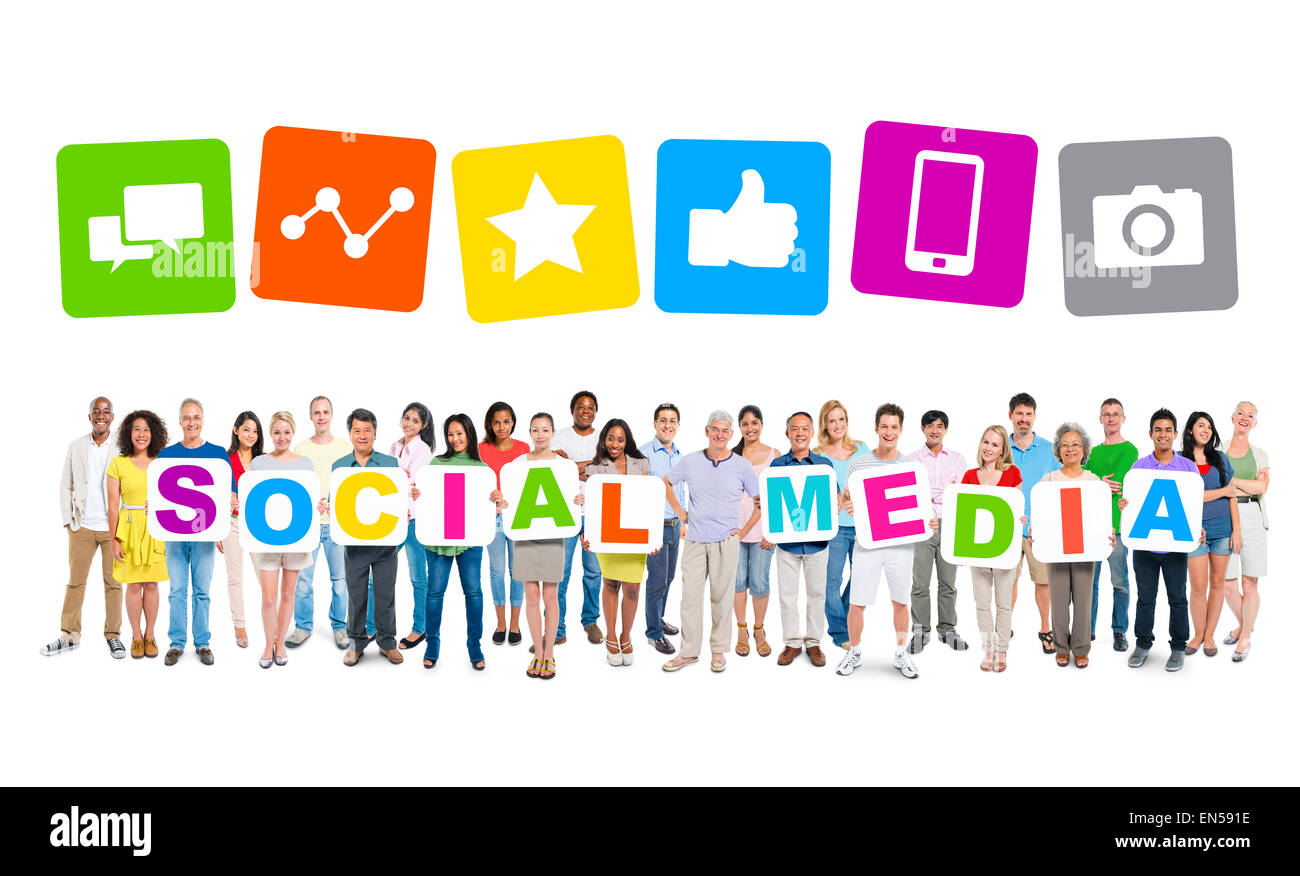 Multi-ethnic group of people holding 11 letters of placards forming ...