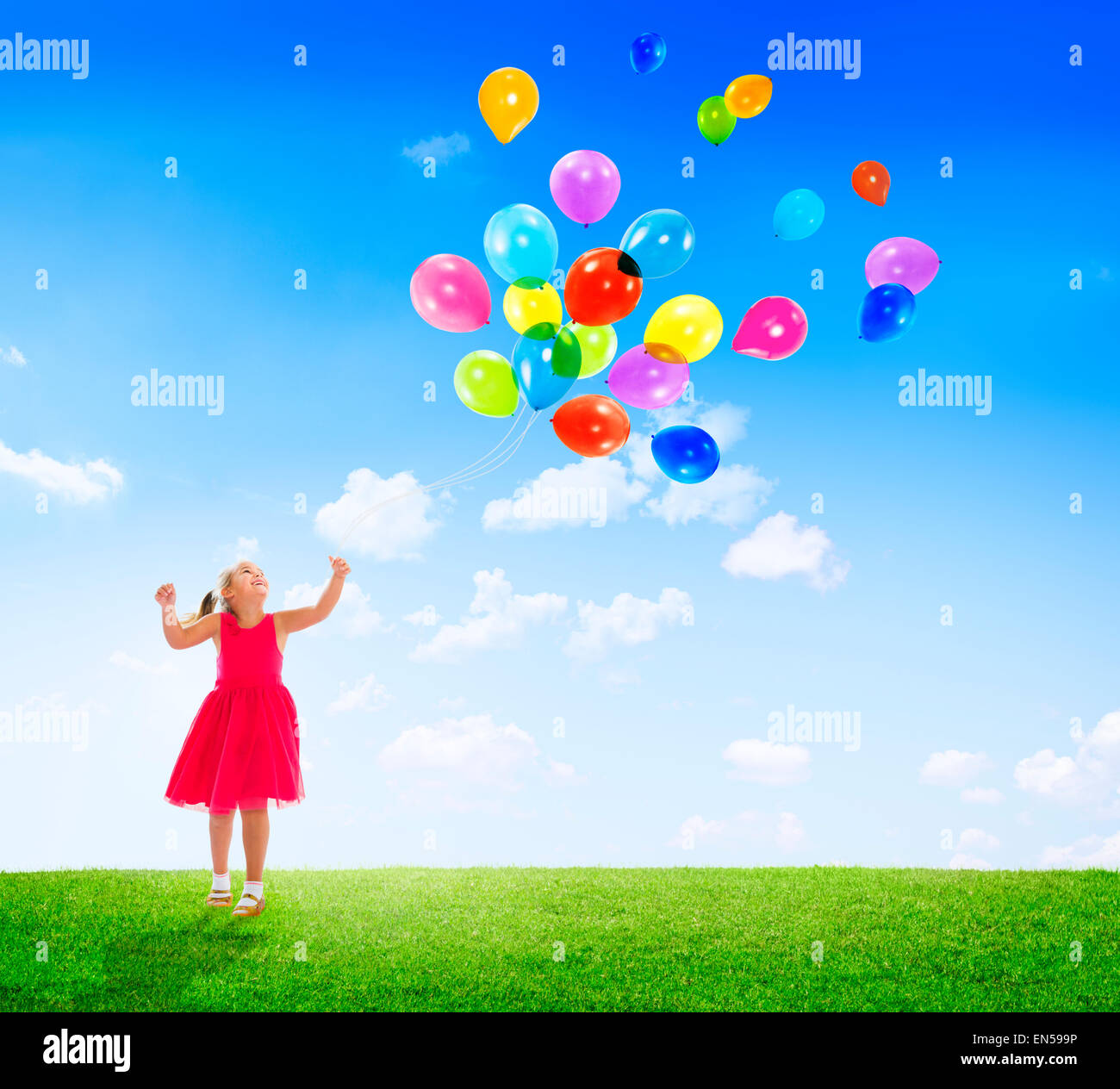 Little Girl Playing with Balloons Outdoors Stock Photo - Alamy
