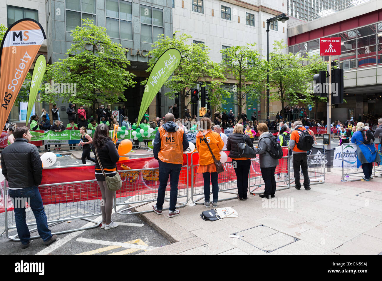 Crowds of spectators watching the 2015 Virgin Money London Marathon ...