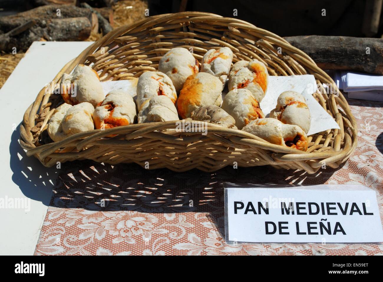 Firewood cooked bread in a basket on a market stall at the Medieval ...