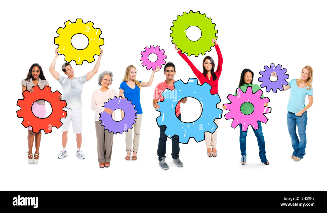 Diverse People Holding Colorful Cogs Stock Photo - Alamy