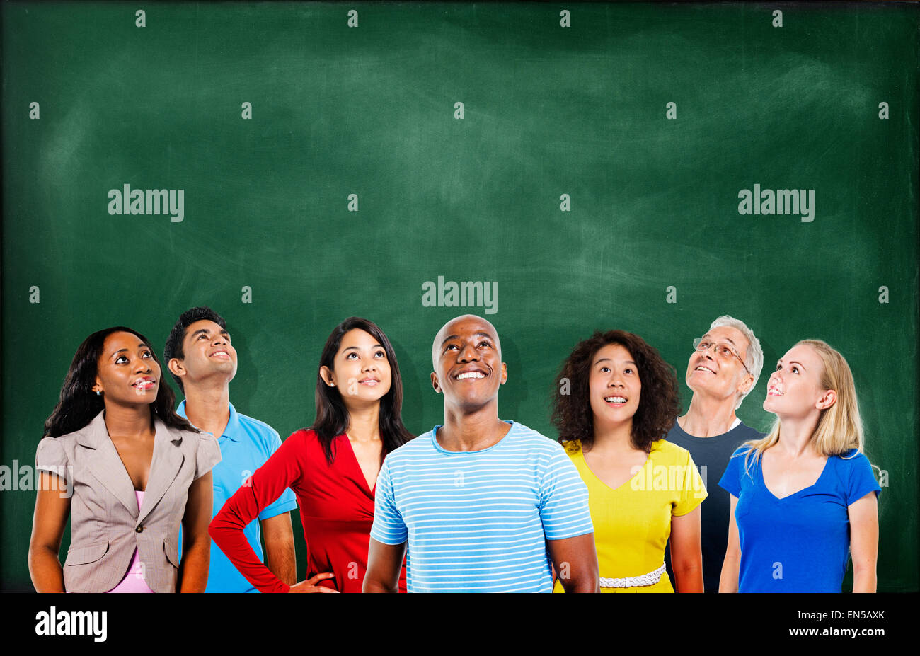 Group of Multiethnic Students Looking Up with Blackboard Stock Photo ...