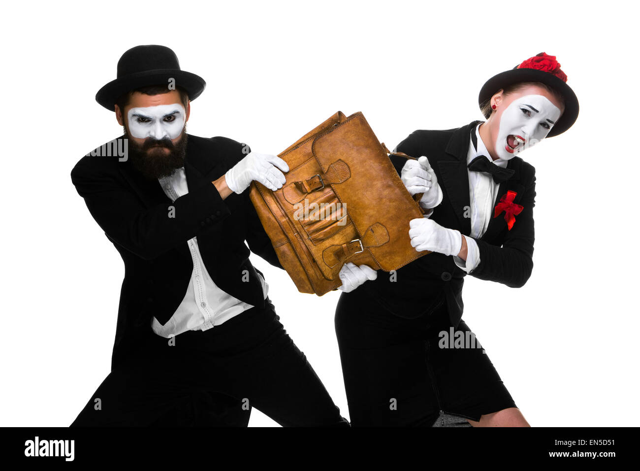 Business man and woman fighting over briefcase Stock Photo - Alamy