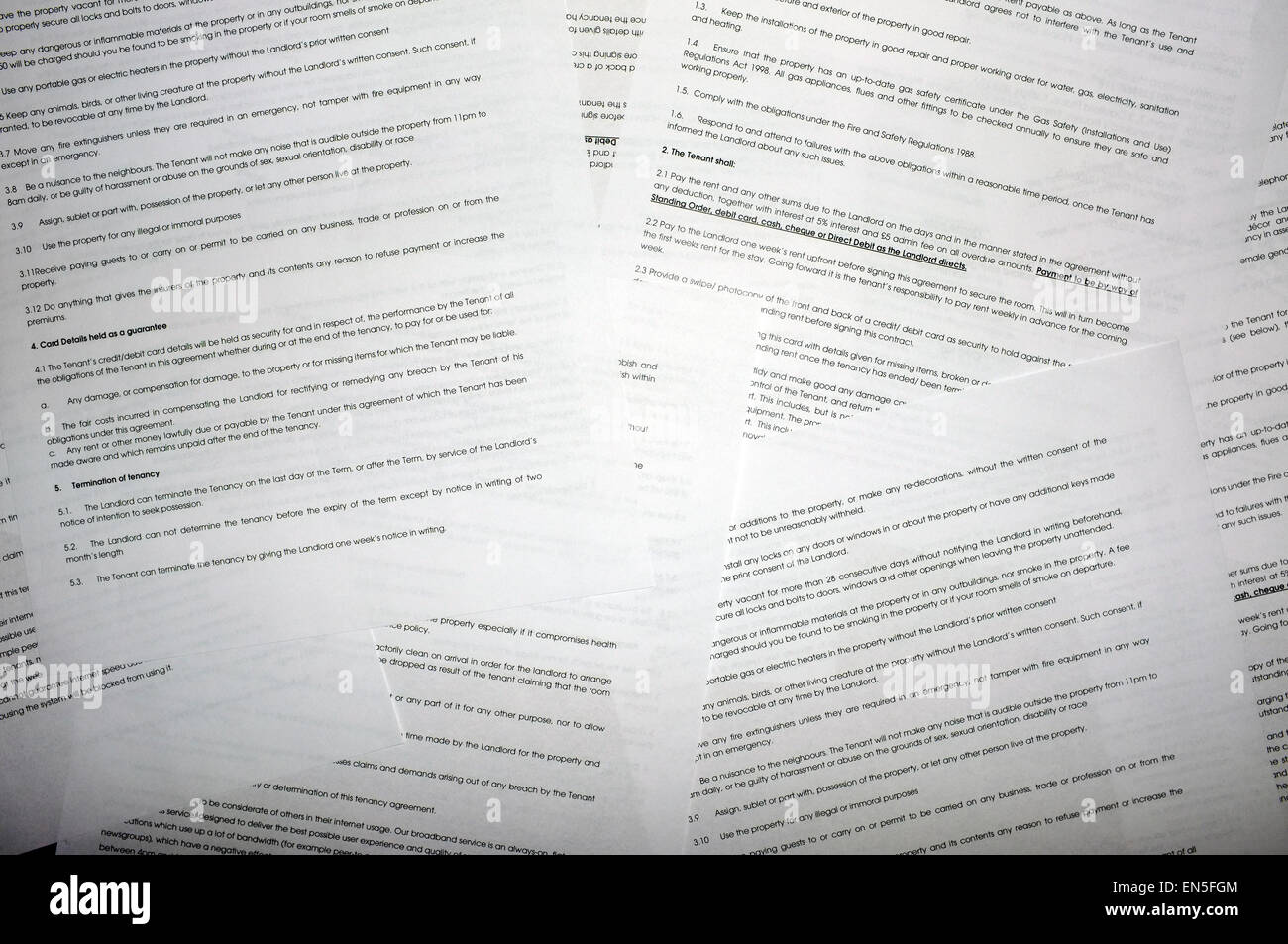 The small print visible on a selection of papers Stock Photo - Alamy
