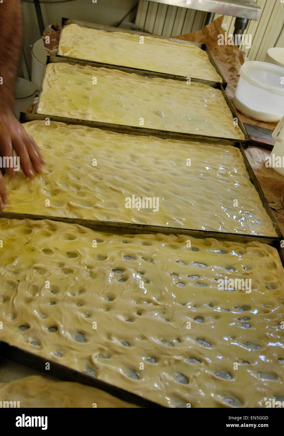 preparation of typical ligurian salt cake, original italian food ...