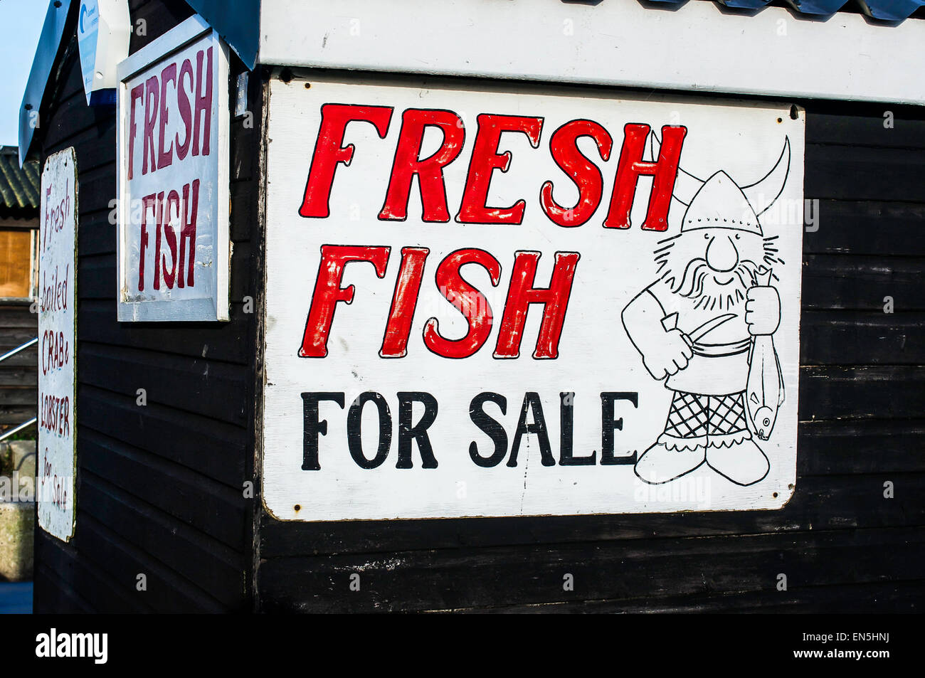 Fresh Fish For Sale sign on a seaside shack in England Stock Photo - Alamy