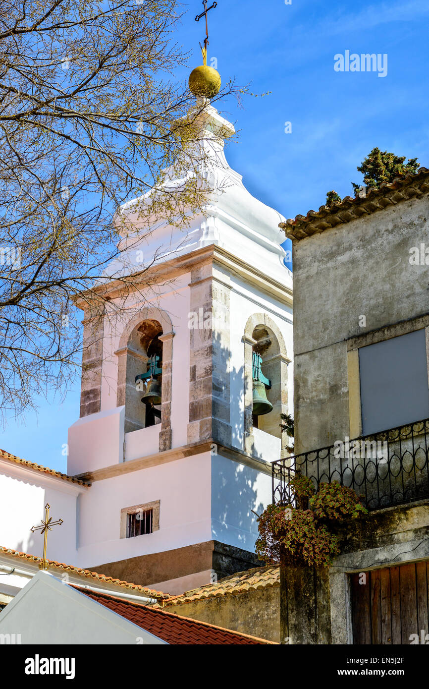 White bell tower in the alfama district in Lisbon, Portugal Stock Photo ...