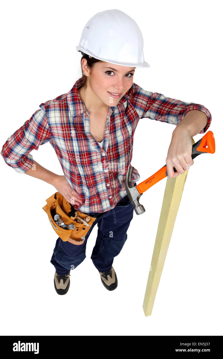 Lady carpenter with hammer Cut Out Stock Images & Pictures - Alamy