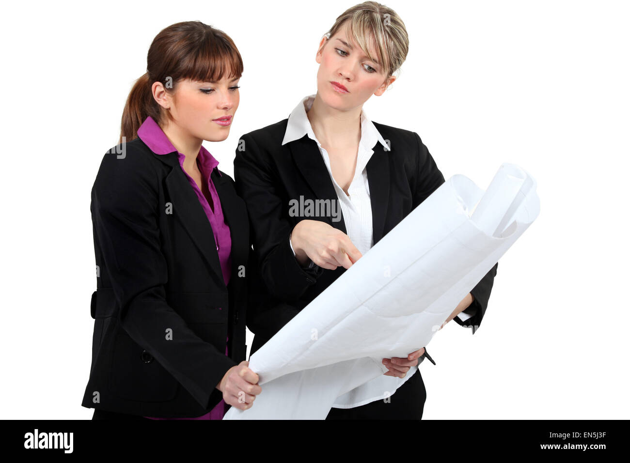 Women looking at a plan Stock Photo - Alamy