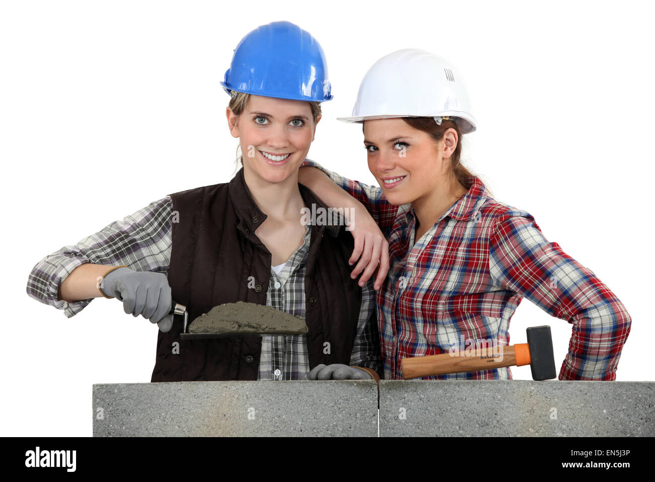 Women building wall Stock Photo - Alamy